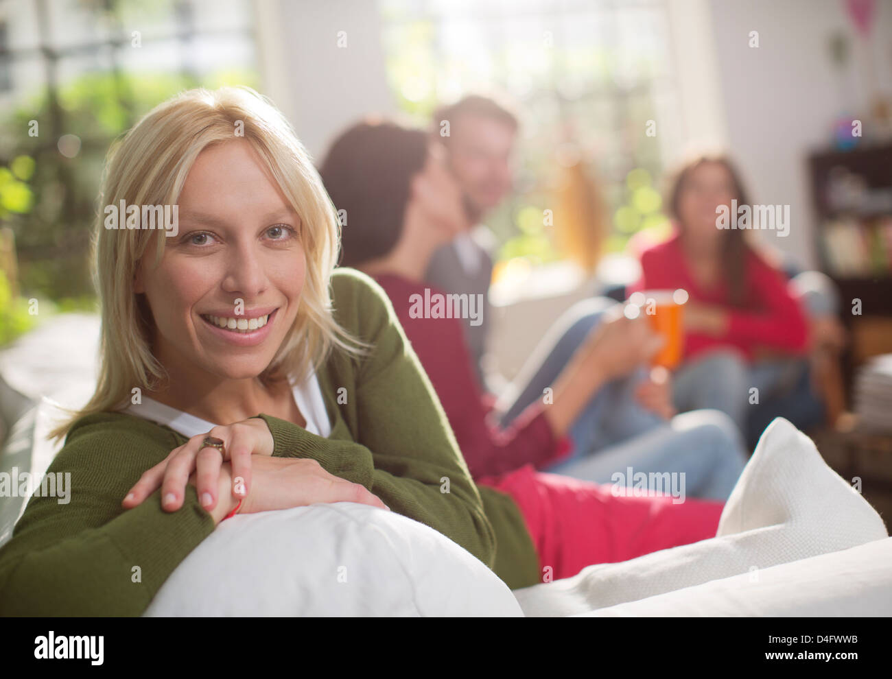 Seated man reclining woman hi-res stock photography and images - Alamy