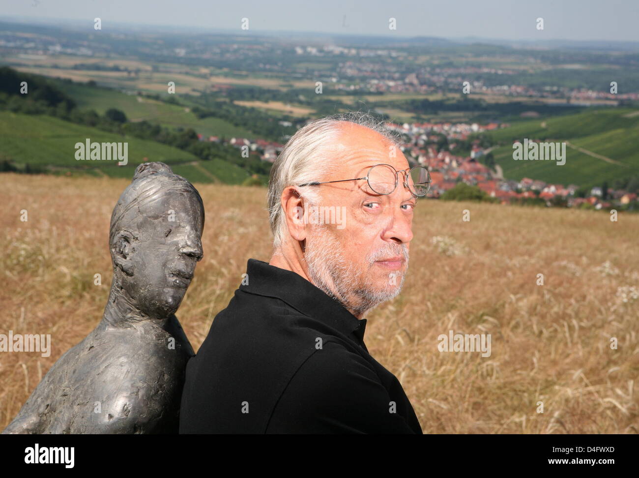 German sculptor Karl Ulrich Nuss poses next to one of his sculptures ...
