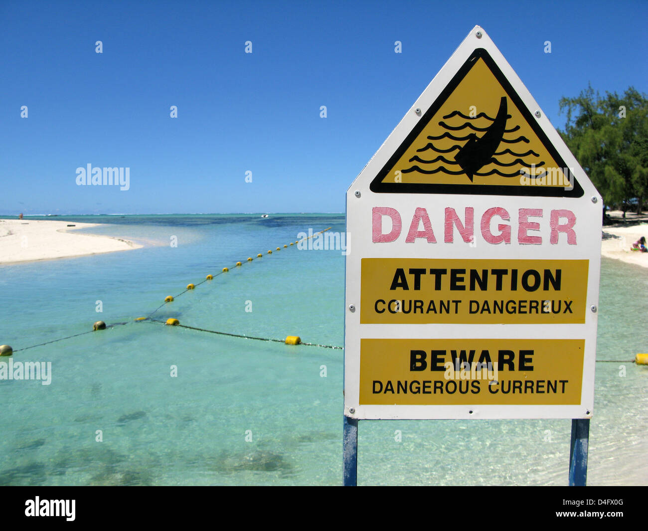 A sign warns of dangerous currents on Ile aux Cerfs in Mauritius, 09 ...