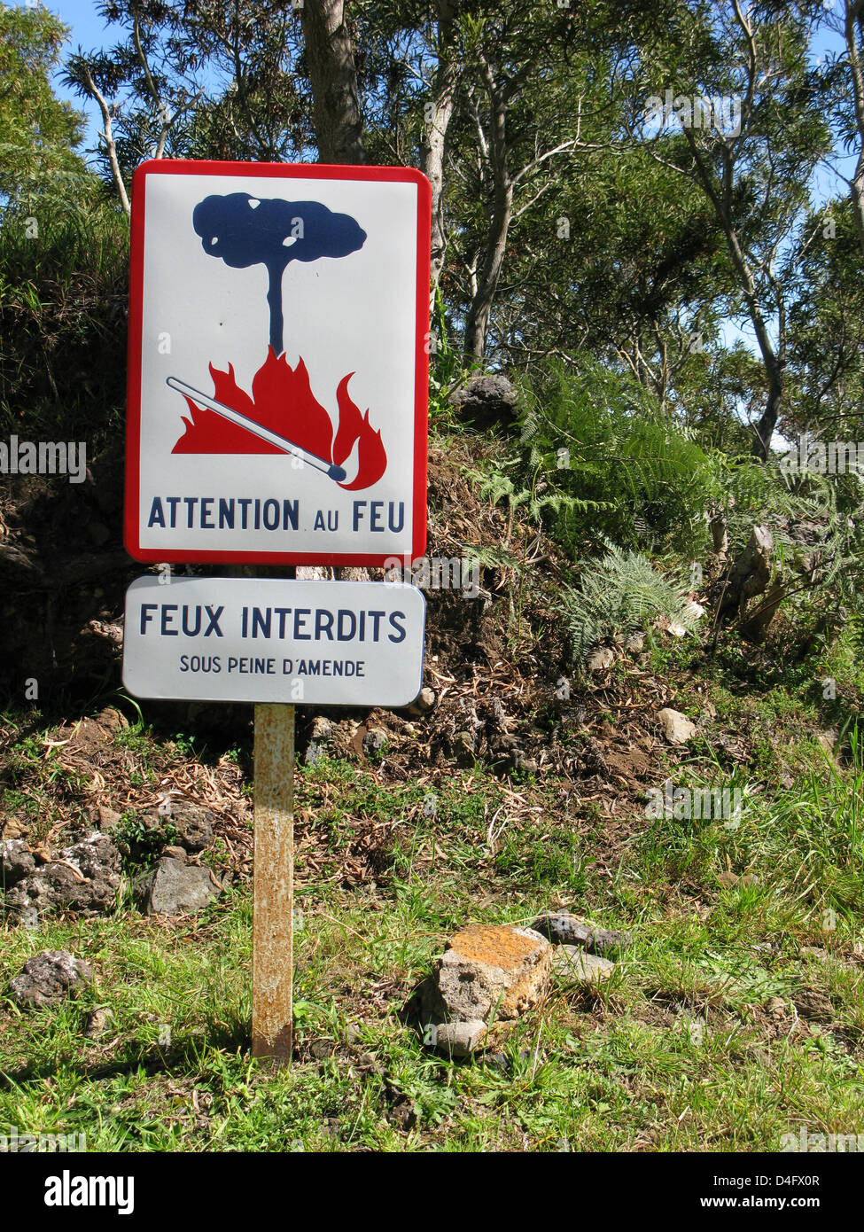 The picture shows a fire warning sign on La Reunion, an overseas region ...
