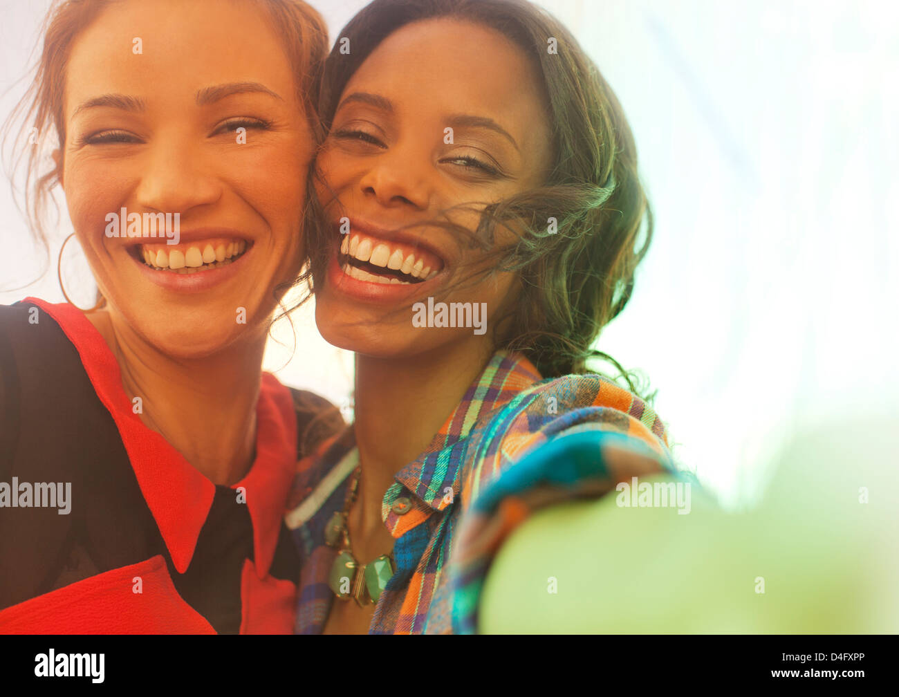 Women smiling together outdoors Stock Photo - Alamy Women smiling together outdoors Stock Photo - Alamy