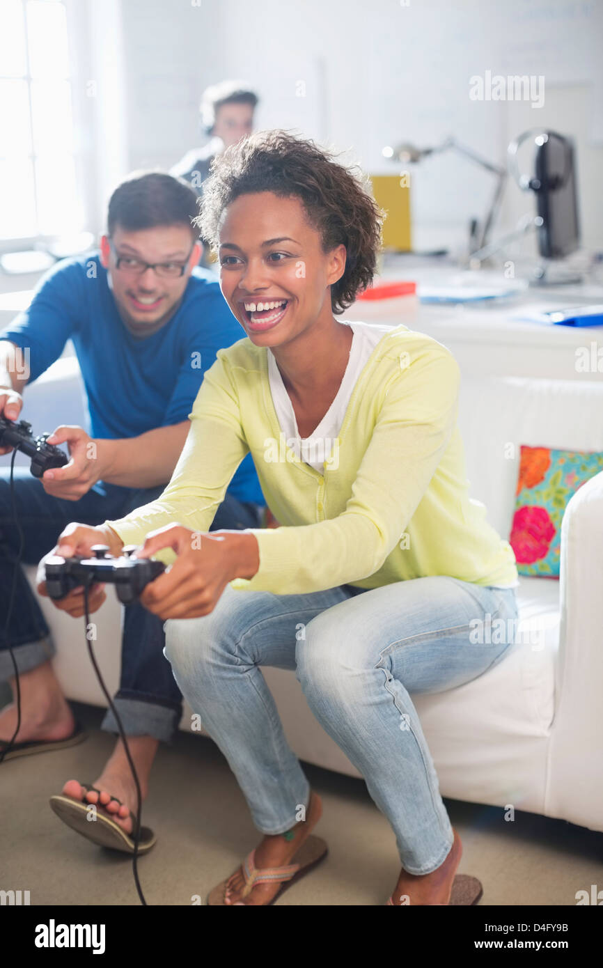 Couple playing video games together Stock Photo - Alamy