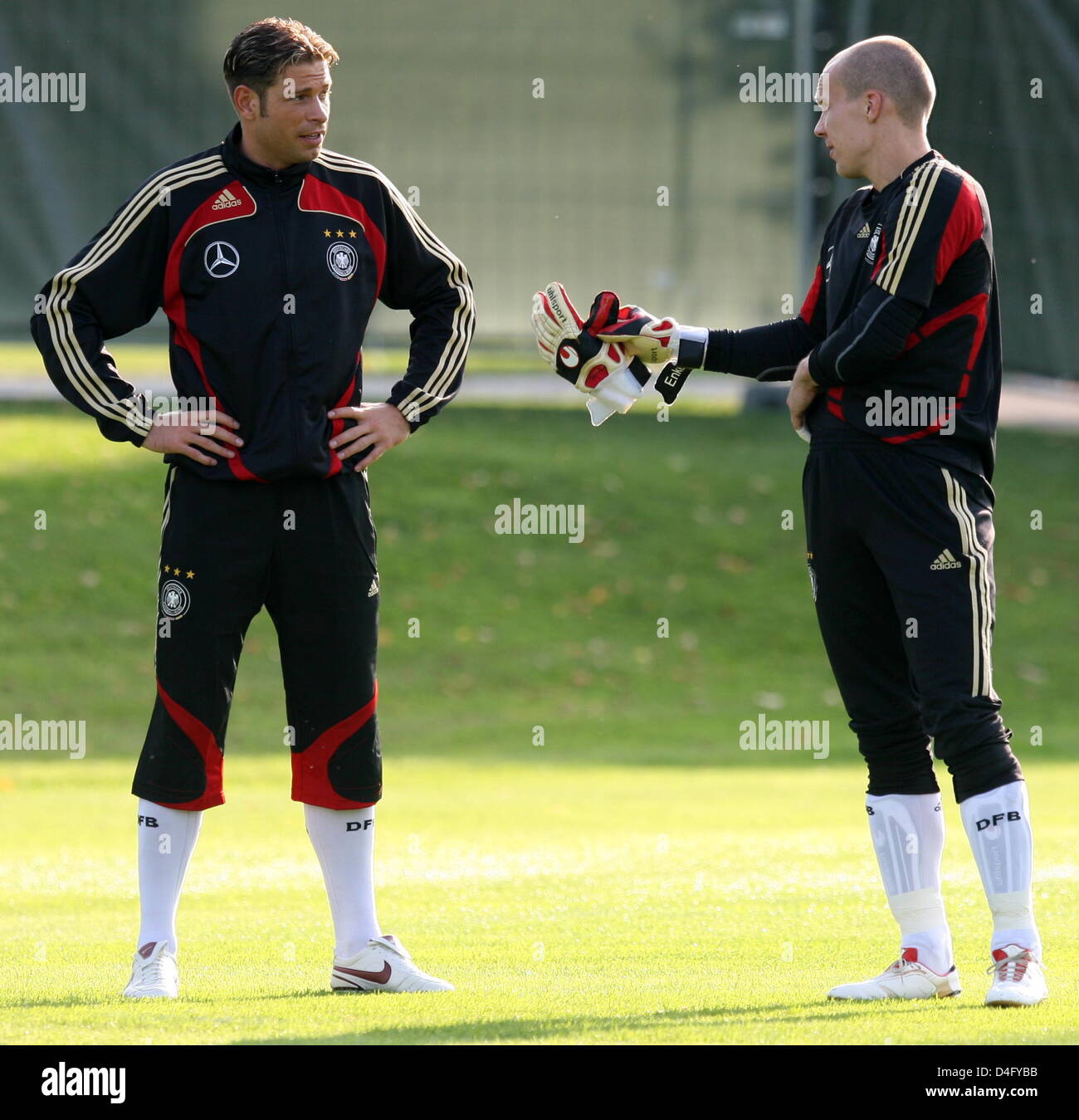 German national goalkeeper Robert Enke (R) and Tim Wiese (L) chat ...