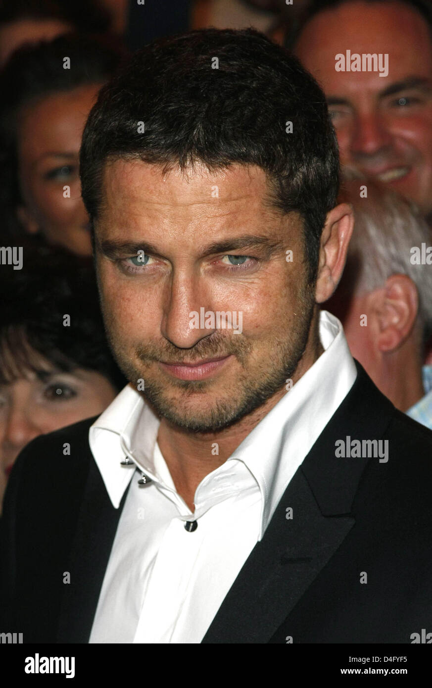 Scottish actor Gerard Butler arrives at the premiere of 'Rocknrolla ...