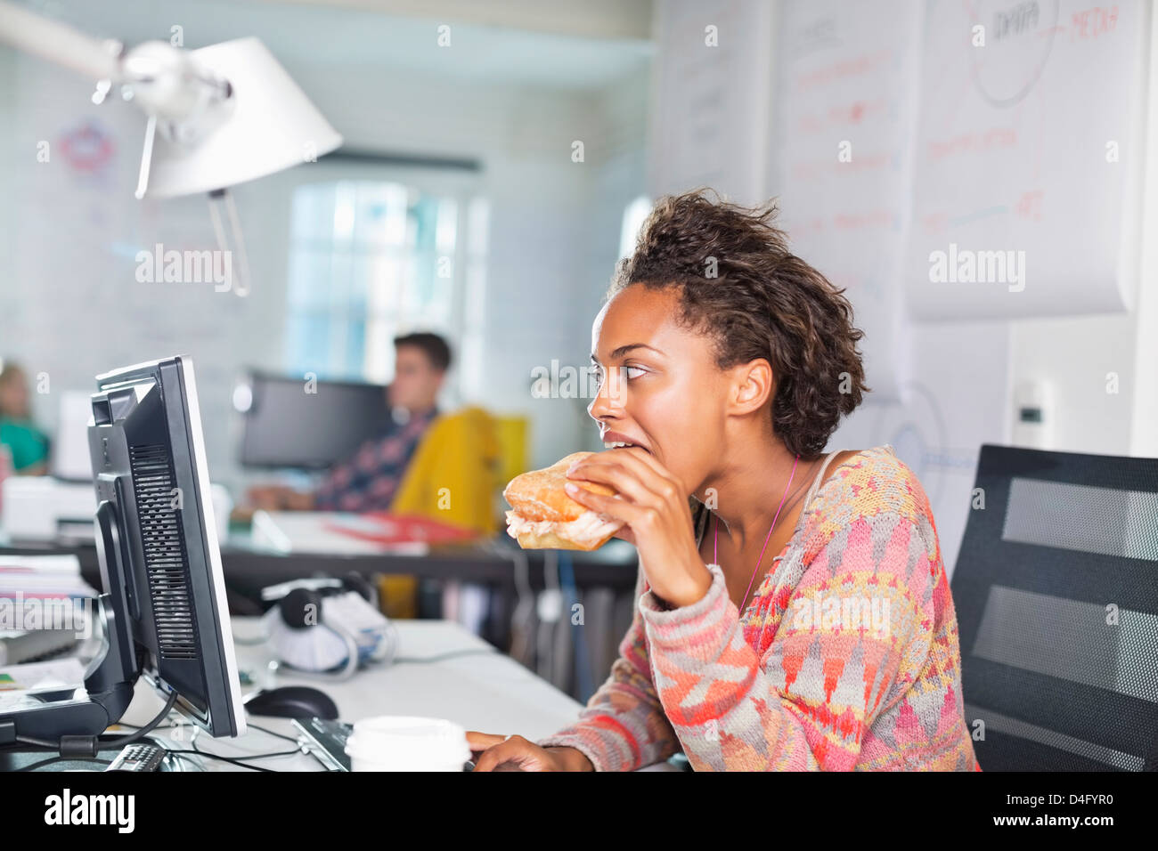 Eating desk burger hi-res stock photography and images - Alamy