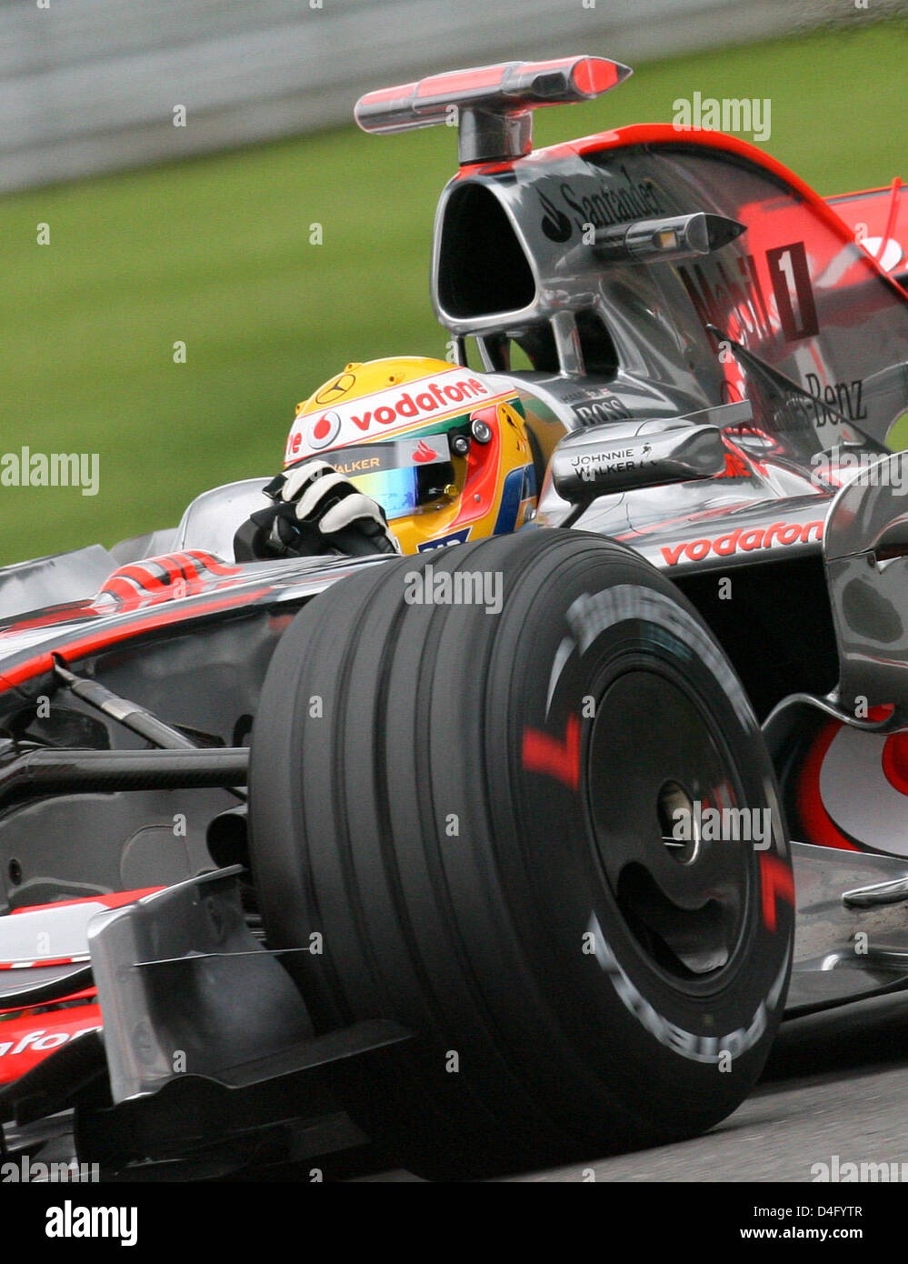 British Formula One driver Lewis Hamilton of McLaren Mercedes steers ...