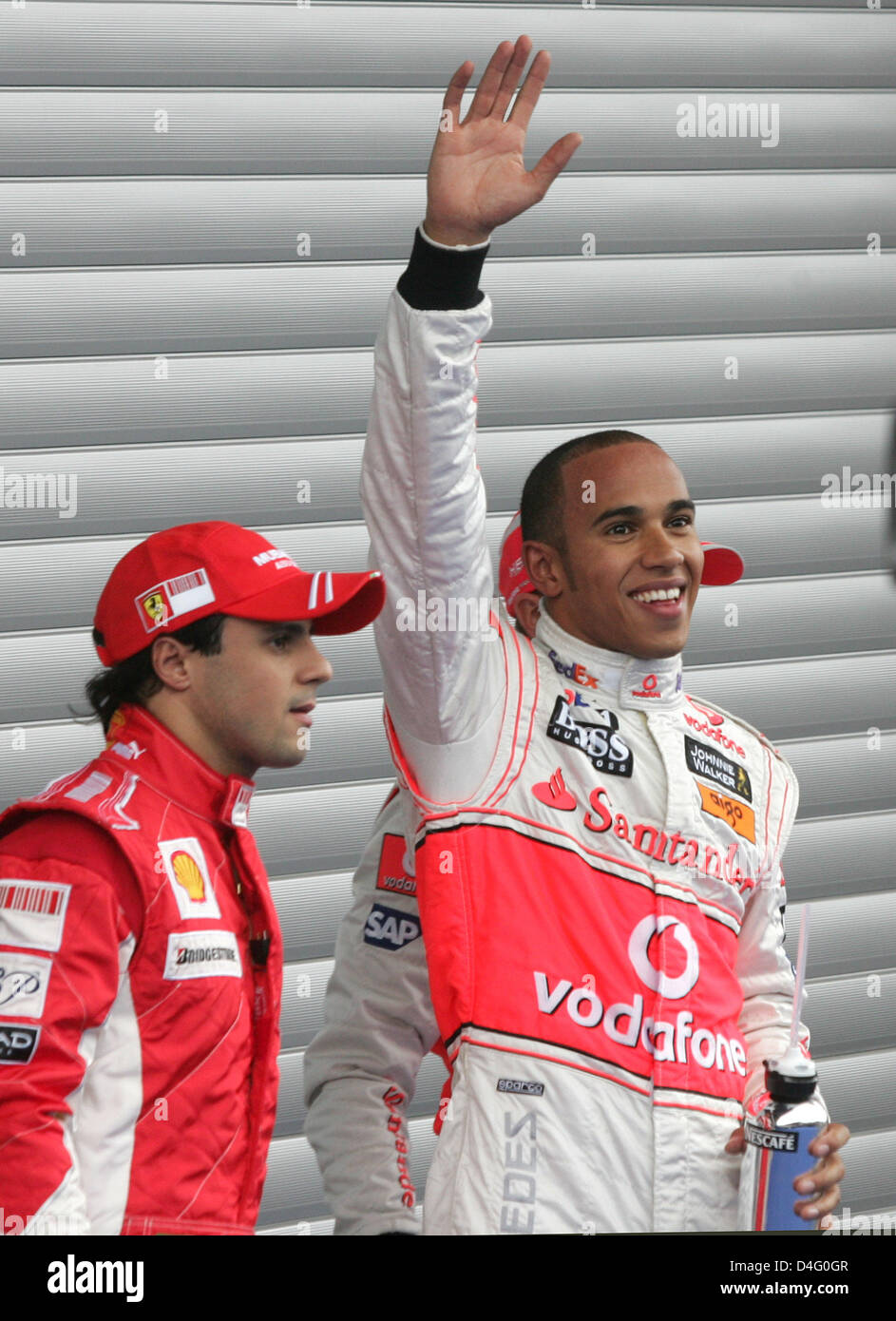 Brazilian Formula One driver Felipe Massa (L) of Ferrari and British ...