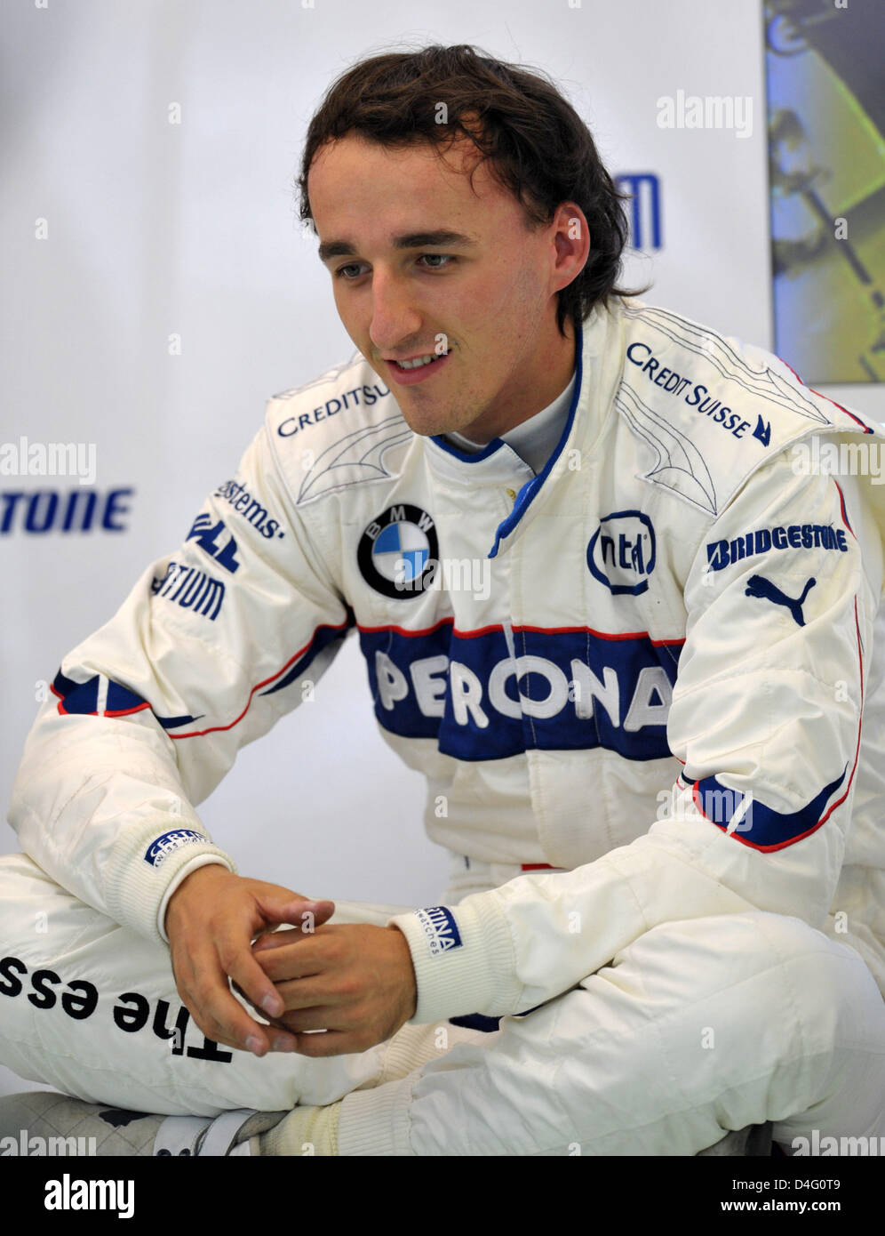 Polish Formula One driver Robert Kubica of BMW Sauber smiles in the ...