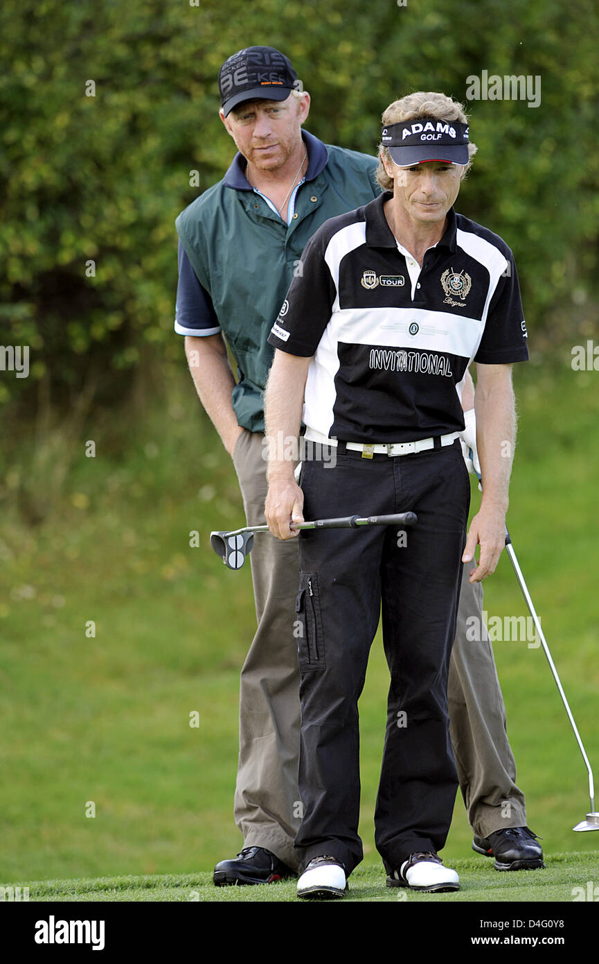German professional golf player Bernhard Langer (R) and ex-tennis ...