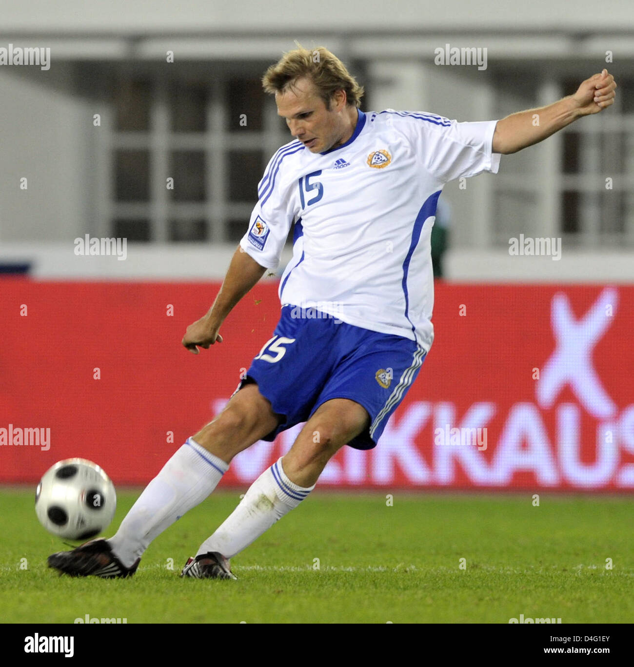 Finnish player Markus Heikkinen plays the ball during the World Cup ...
