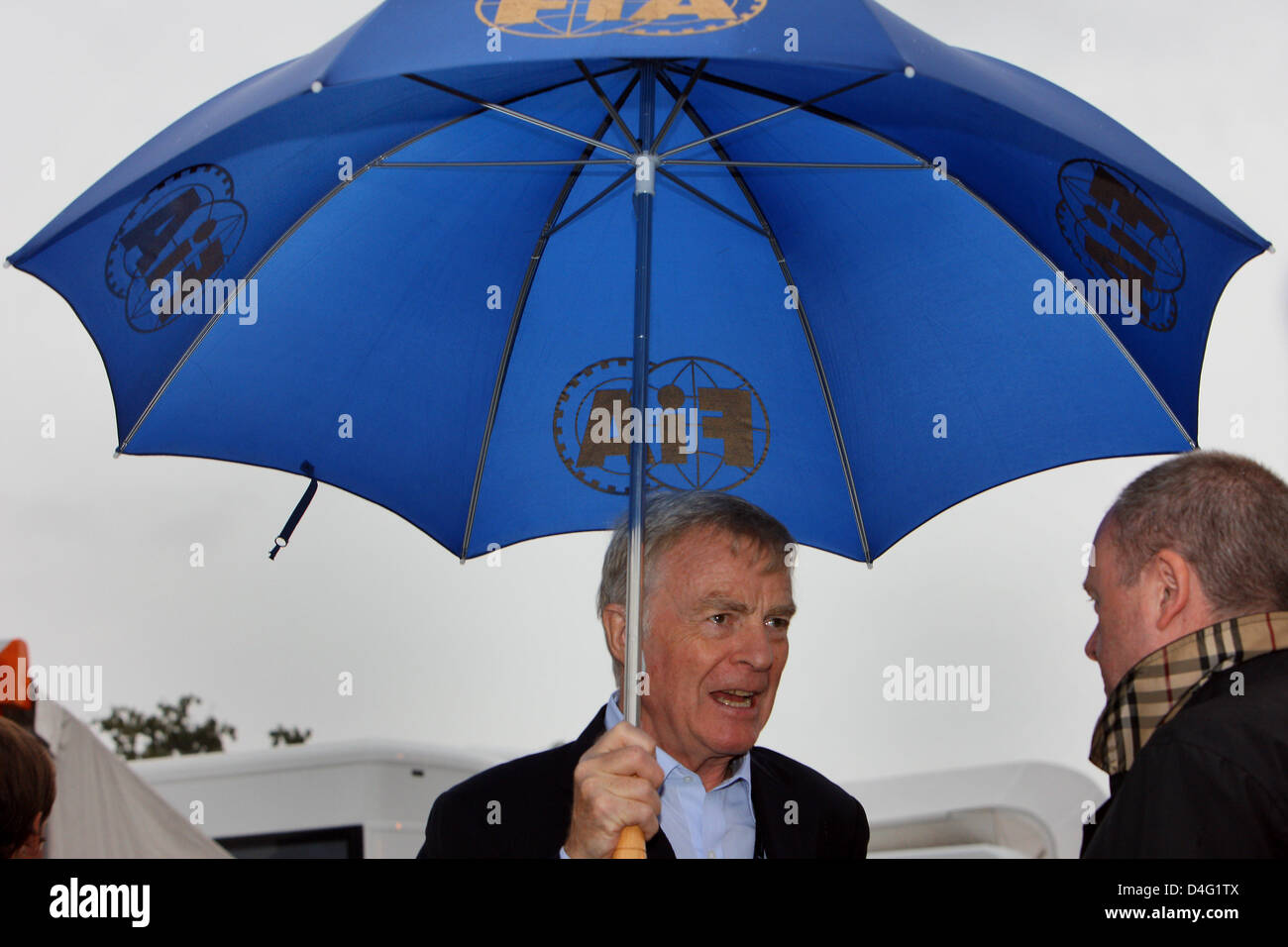 FIA President Max Mosley talks in the paddock at the Autodromo ...