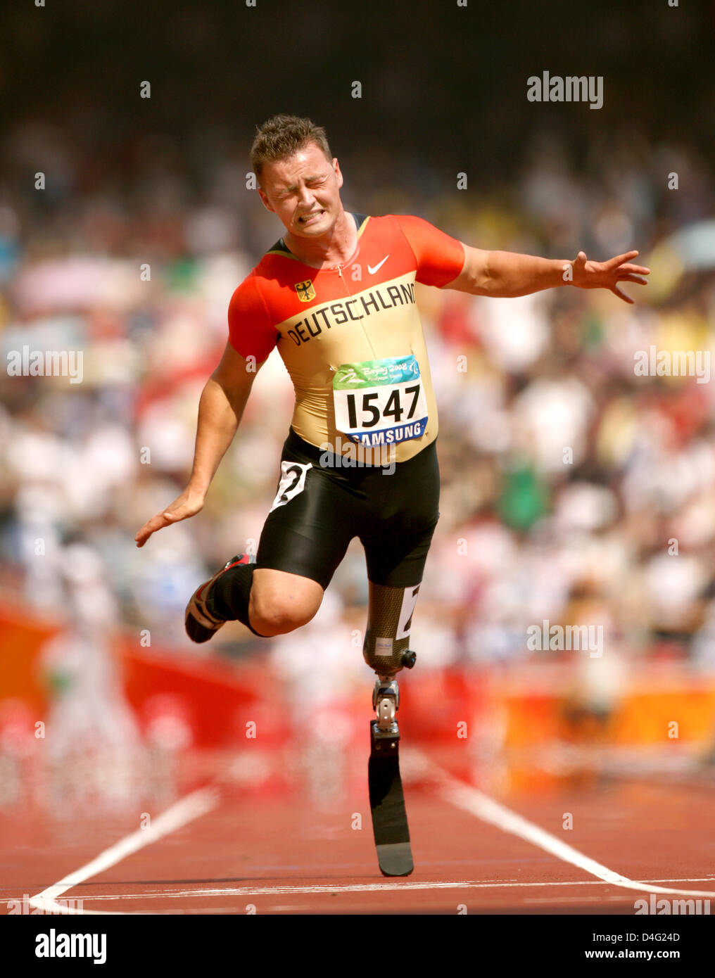 German athelete Heinrich Popow finishes second the 100m at the Beijing ...