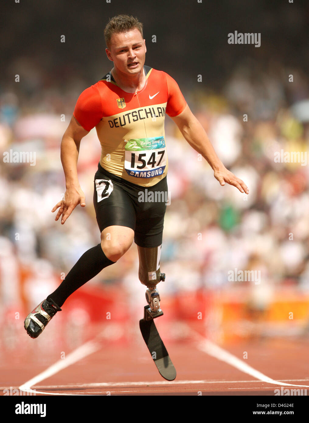 German athelete Heinrich Popow finishes second the 100m at the Beijing ...