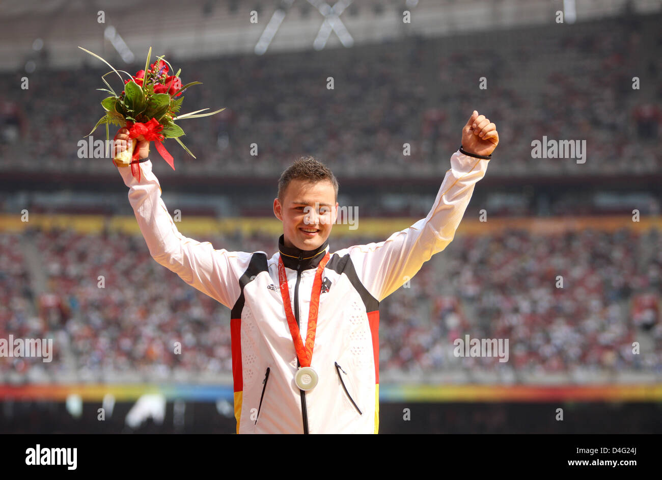 German athelete Heinrich Popow celebrates finishing second the 100m at ...