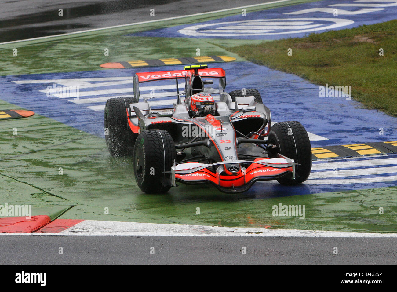 Finnish Formula One driver Heikki Kovalainen of McLaren Mercedes cuts ...