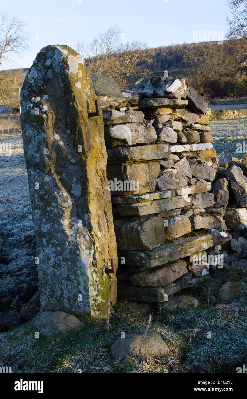 A stone gate post in the Yorkshire Dales Stock Photo - Alamy