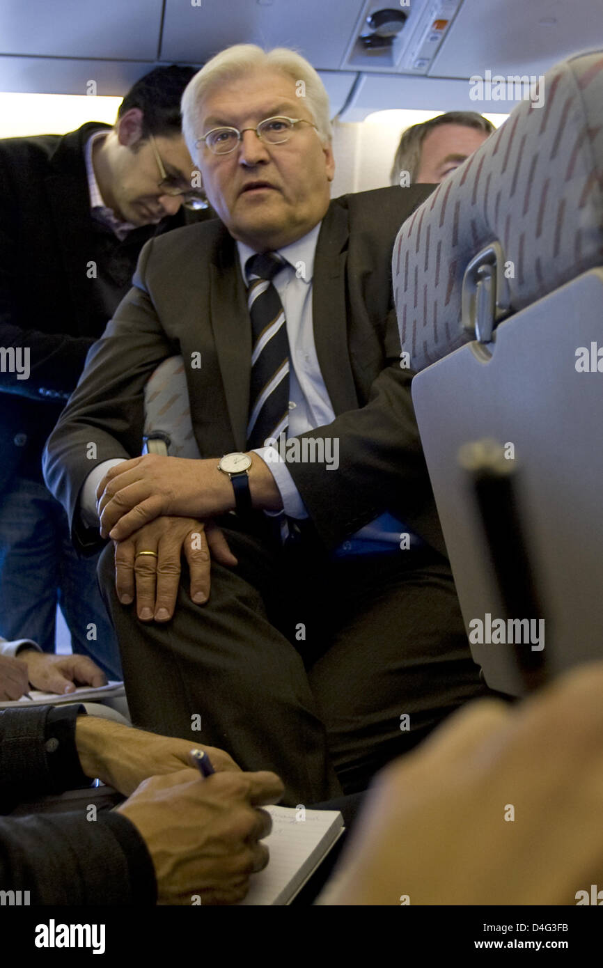 German Foreign Minister Frank-Walter Steinmeier talks to media on board ...