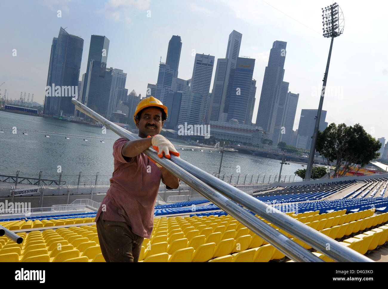 A construction worker prepares the grandstands for the Formula 1 ...