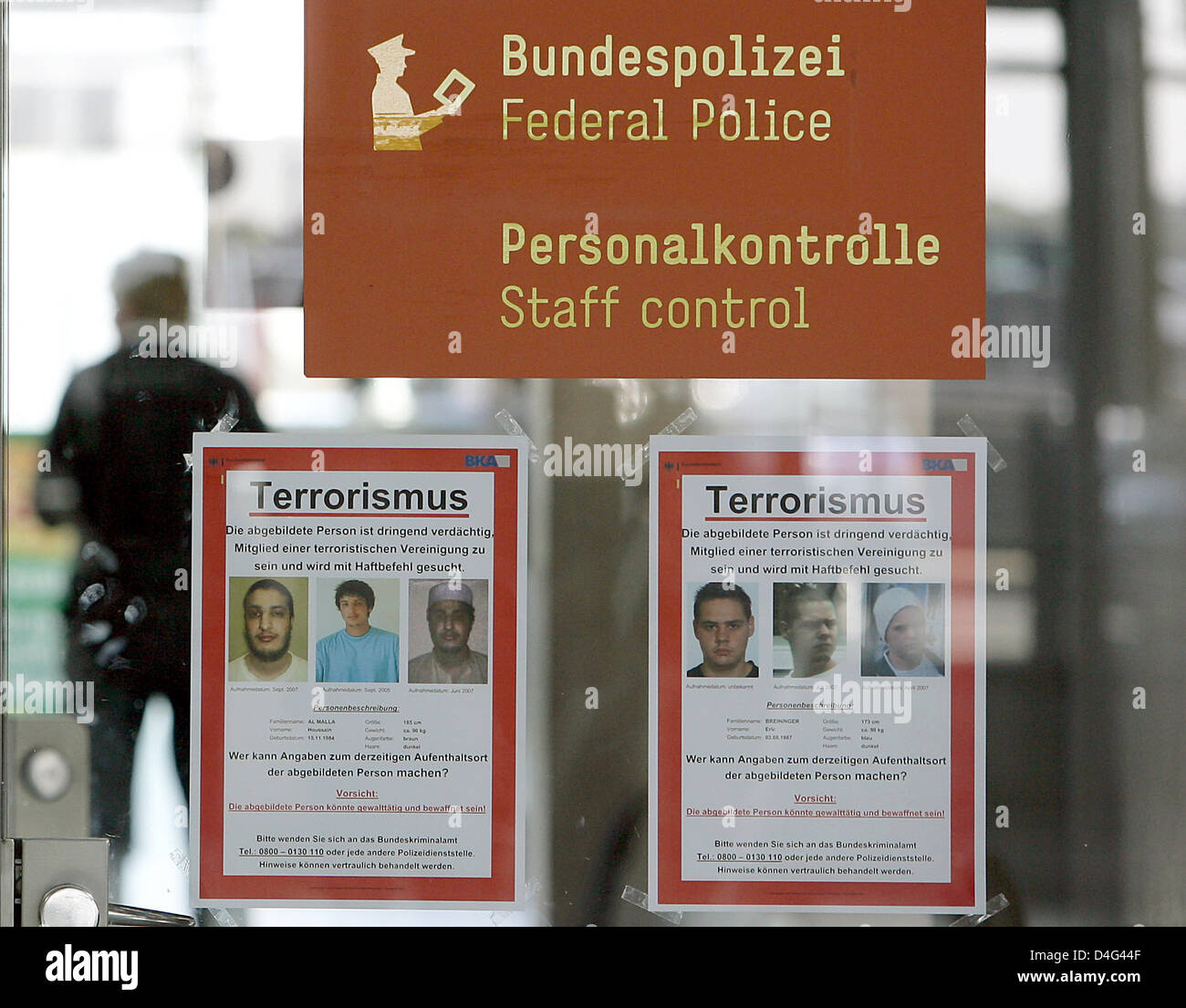 Wanted posters are pictured outside the federal police office at ...