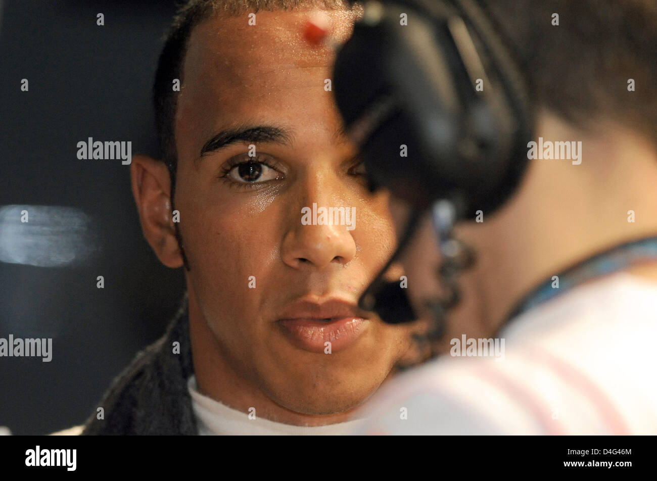 British Formula One driver Lewis Hamilton (L) of McLaren Mercedes ...