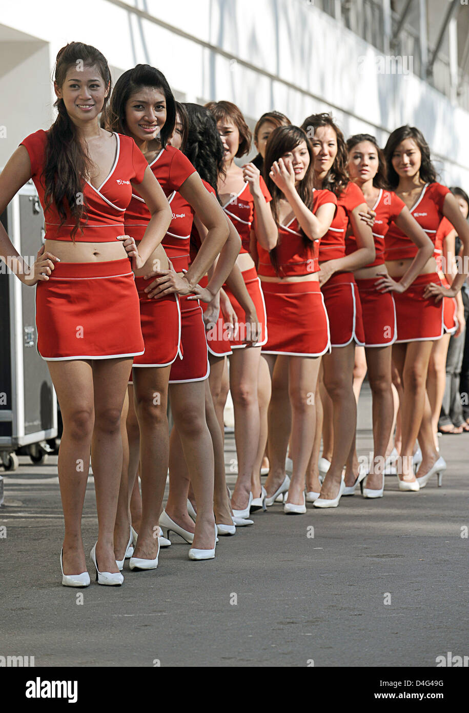 Grid girls pose at the paddock of Marina bay Street Circuit in ...