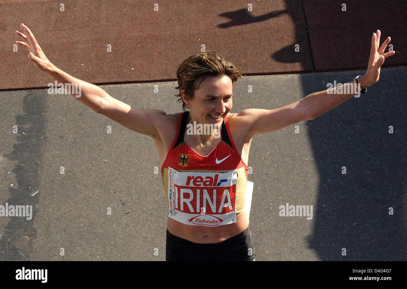 German marathon runner Irina Mikitenko is happy about her victory at ...