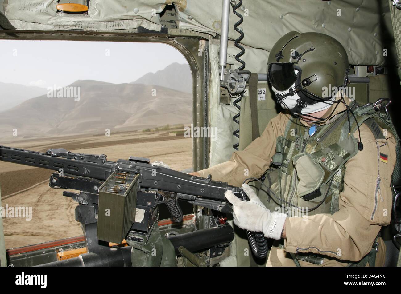 A so called 'doorgunner' secures the rear of a German Bundeswehr CH 53 ...