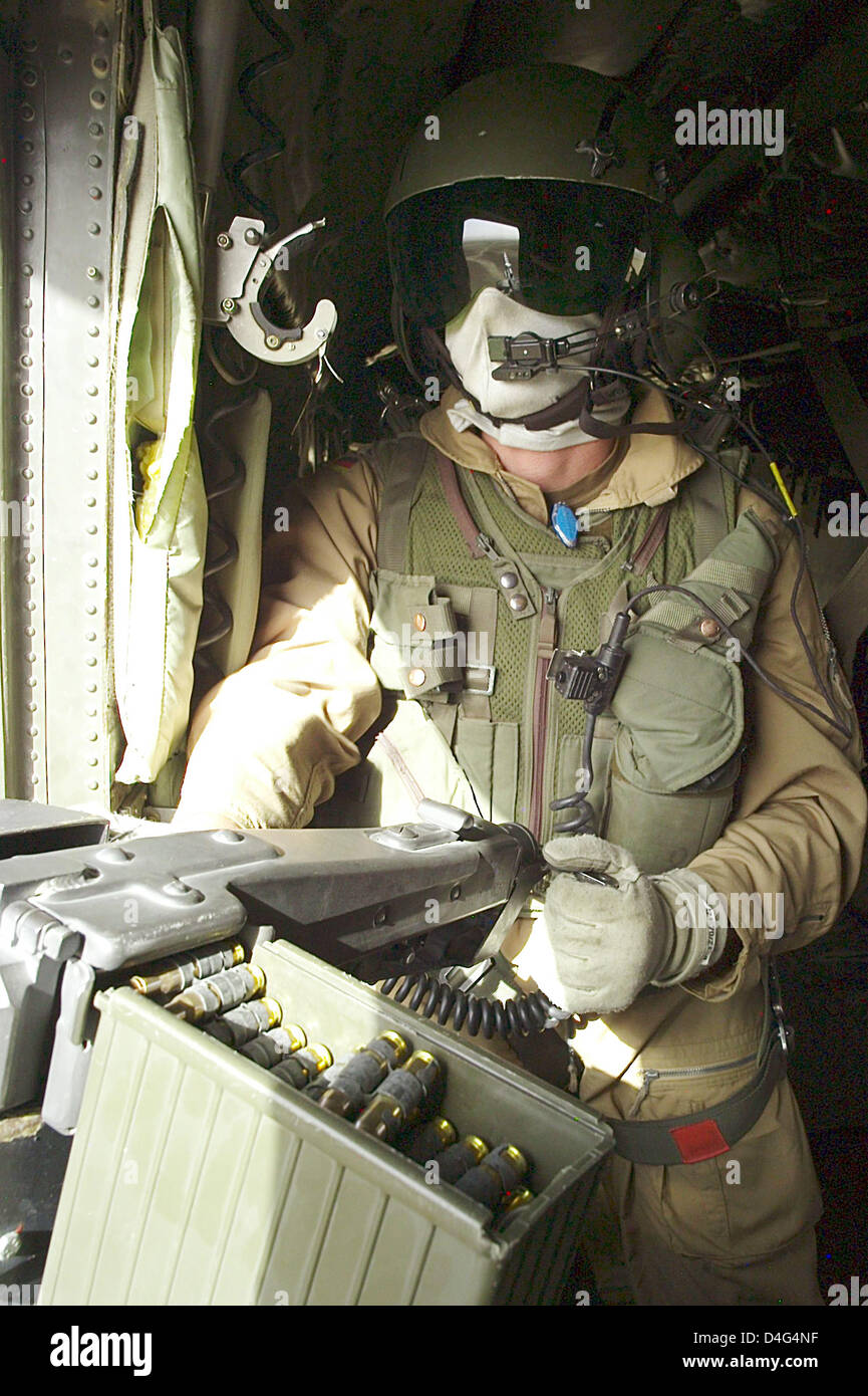 A so called 'doorgunner' secures a German Bundeswehr CH 53 transport ...