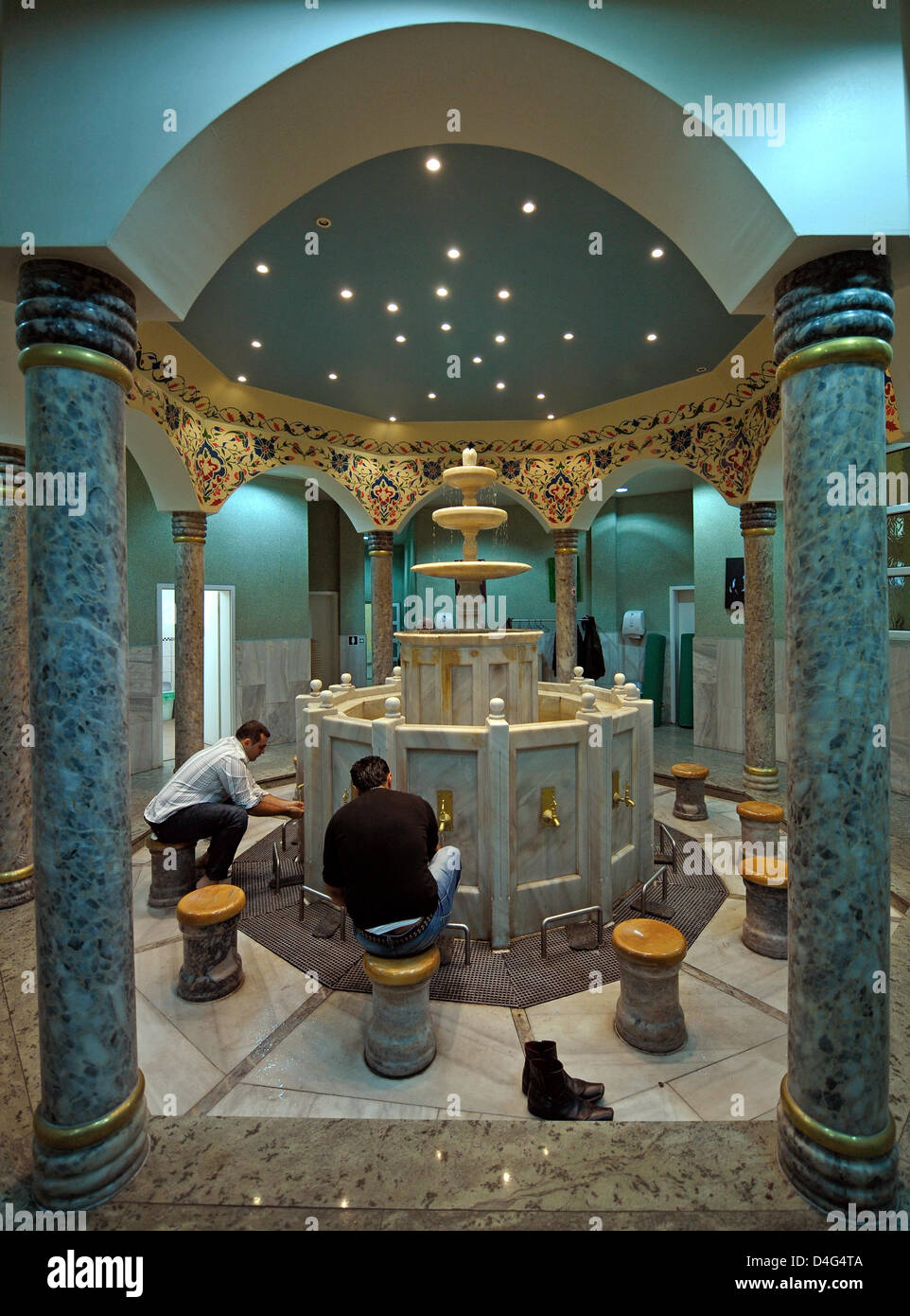 Muslims pictured in a washing room of Yavuz Sultan Selim mosque in ...