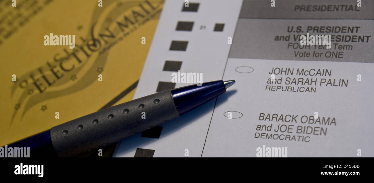 A pen lies ready for the US Presidential Election voting ballot in ...