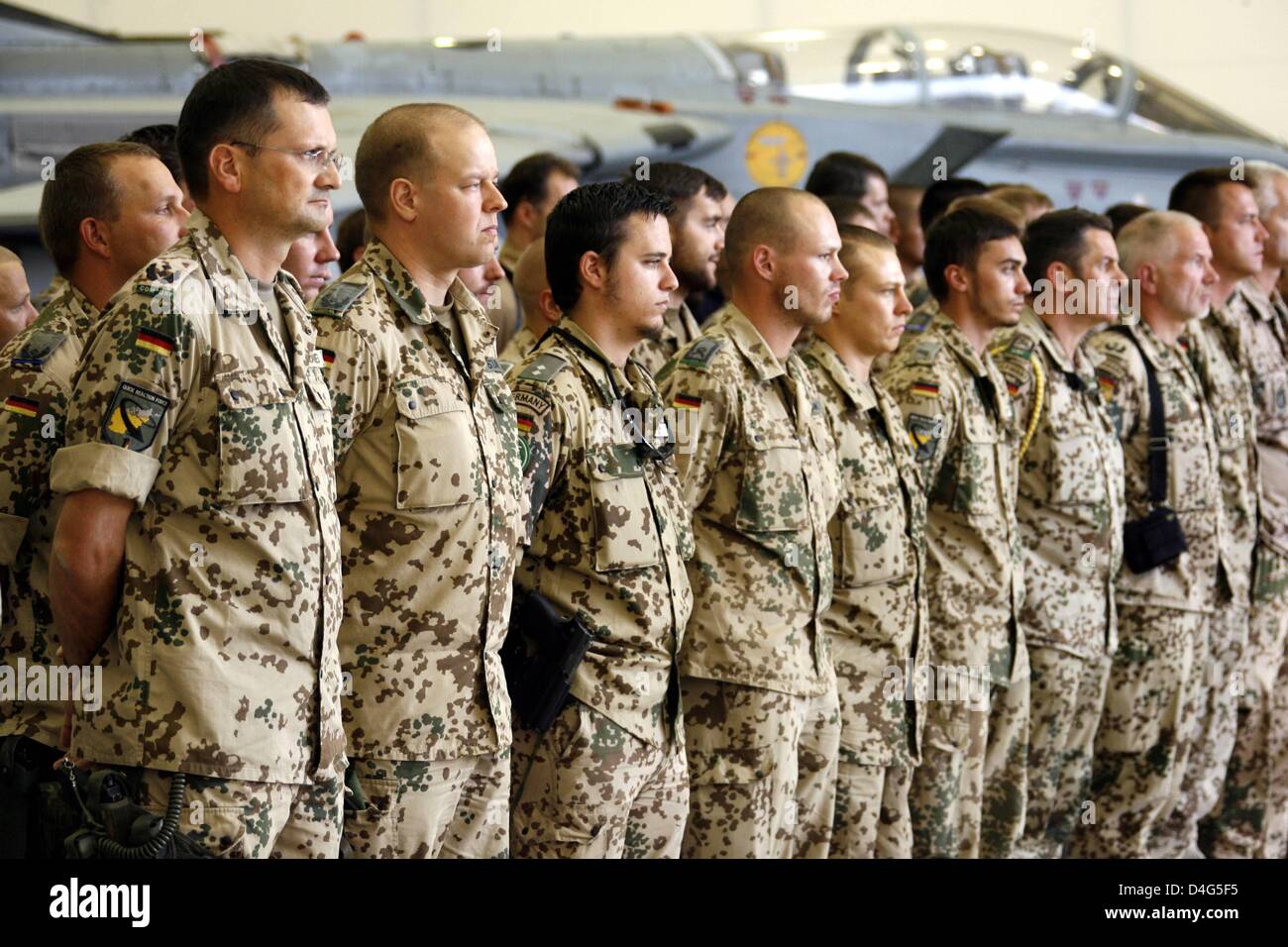 Soldiers of the German Bundeswehr muster on behalf of the 18th 'German ...