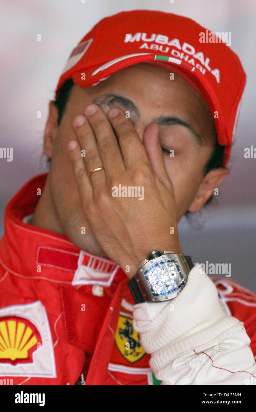 Brazilian Formula One driver Felipe Massa of Scuderia Ferrari gestures ...