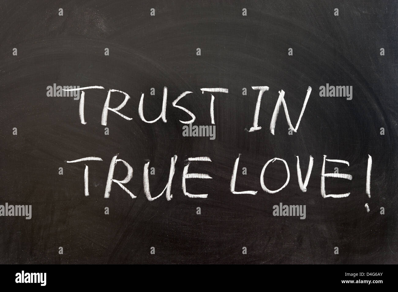 Trust in true love words written on the blackboard Stock Photo - Alamy