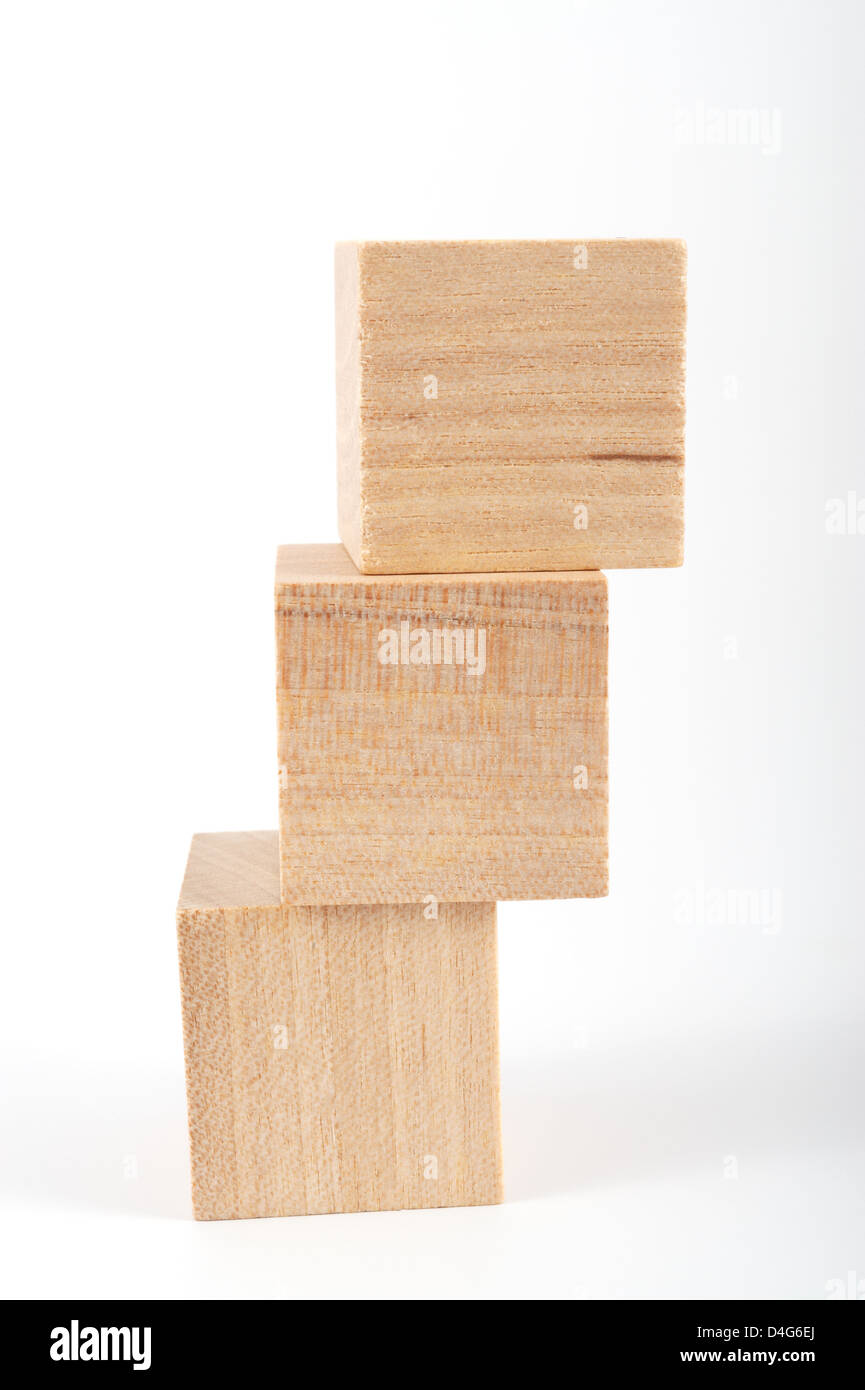 Group wooden blocks tilt hi-res stock photography and images - Alamy