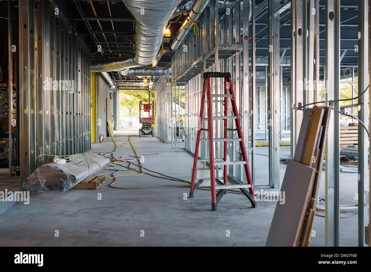 A commercial building under construction central corridor, with roof ...