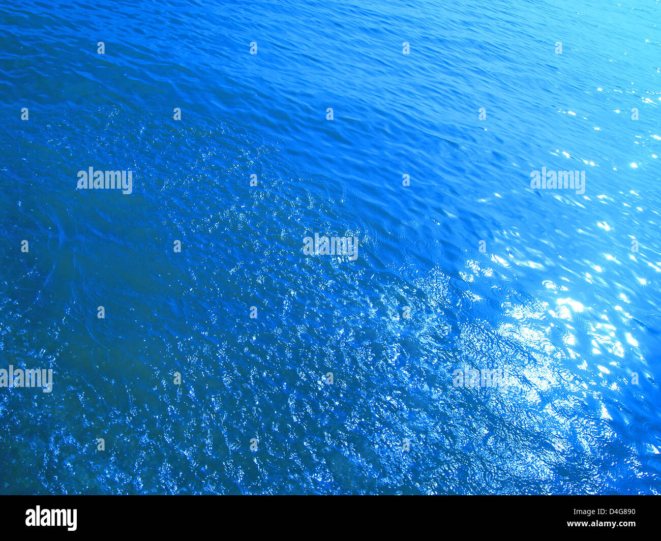 Clear blue ocean water Stock Photo - Alamy