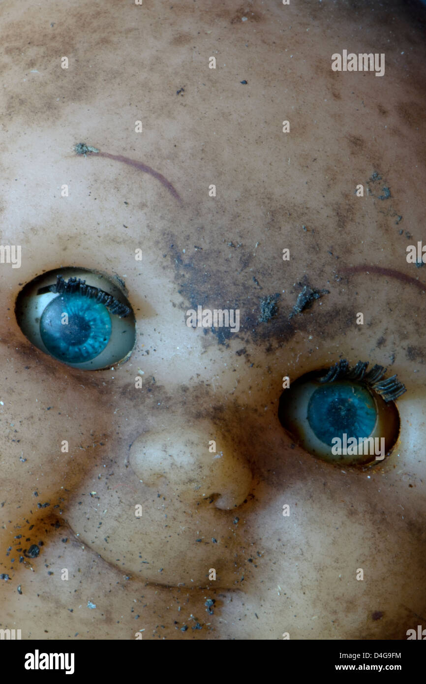 A close up of a decayed dolls head and face Stock Photo - Alamy