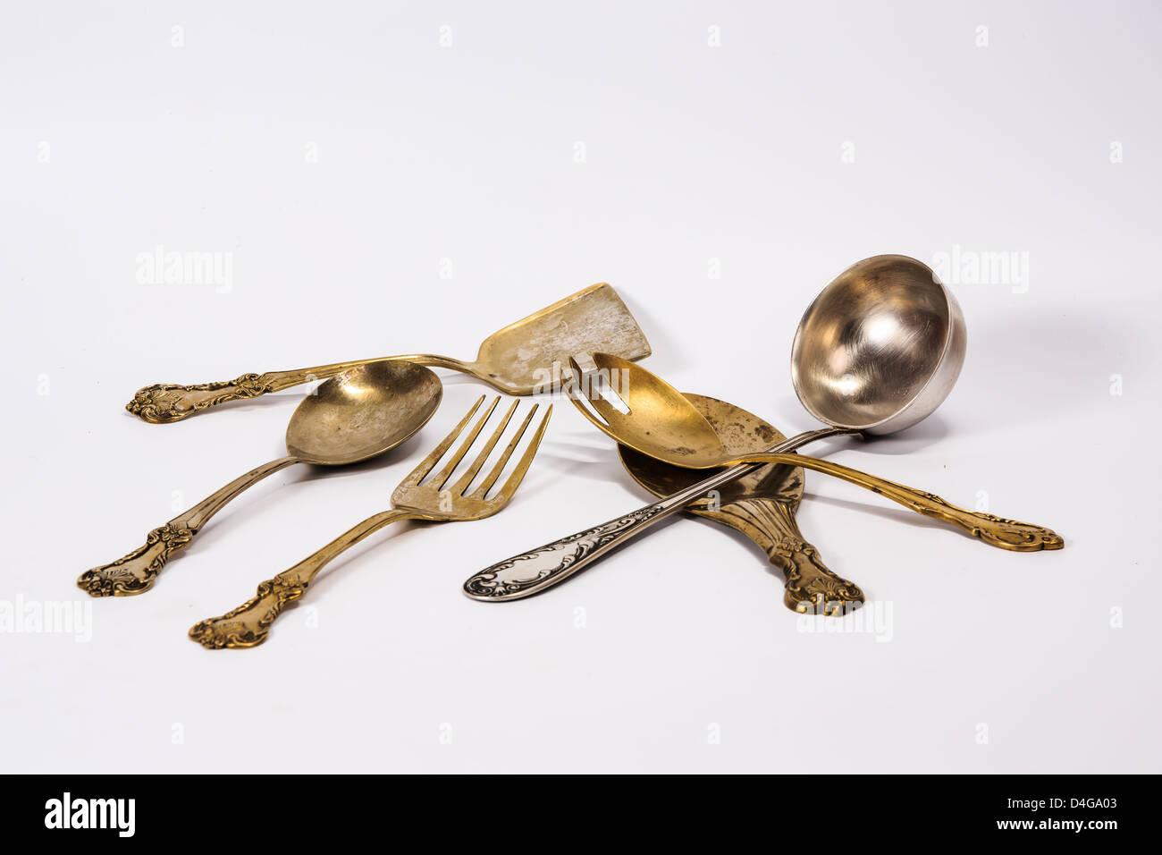 Ancient silverware on a white background Stock Photo - Alamy