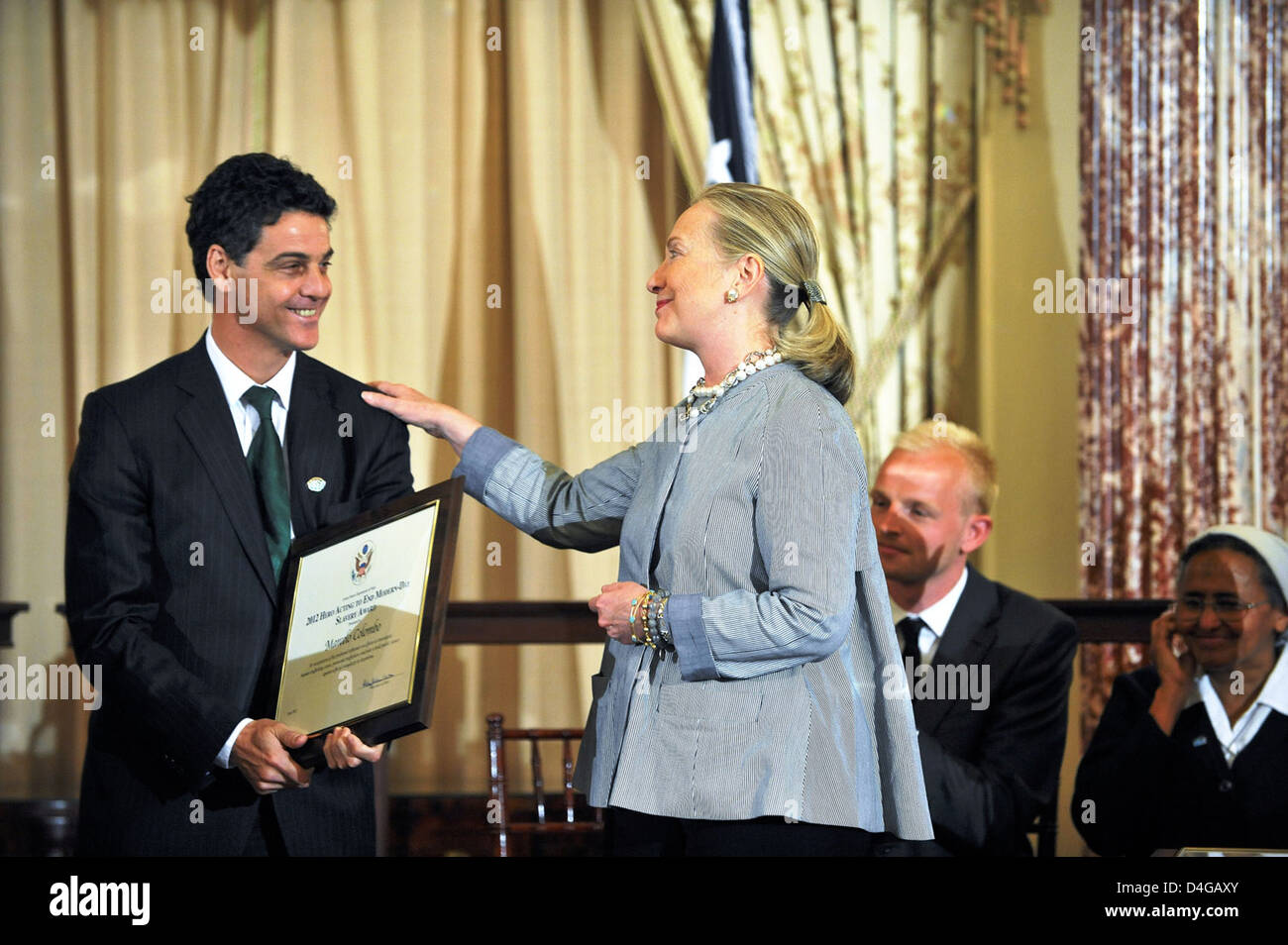 Secretary Clinton With TIP Hero Marcelo Colombo Stock Photo - Alamy