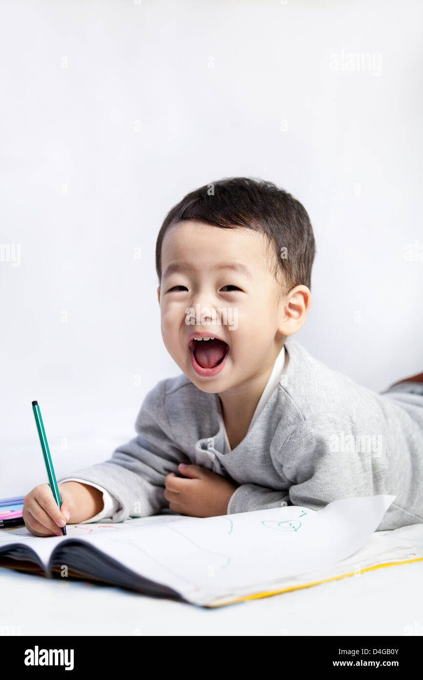 Excited children writing hi-res stock photography and images - Alamy