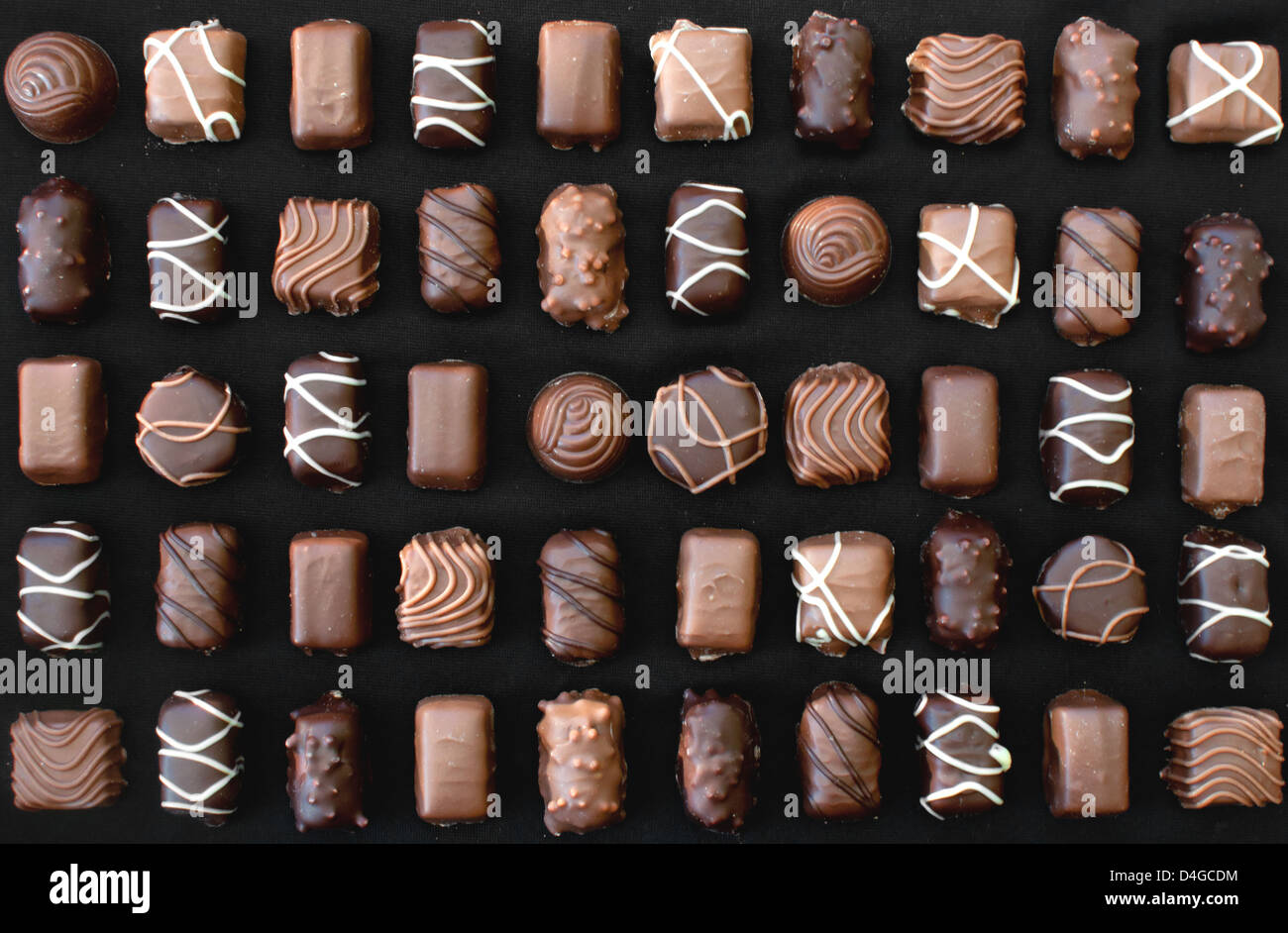 Chocolate candy selection on display Stock Photo - Alamy