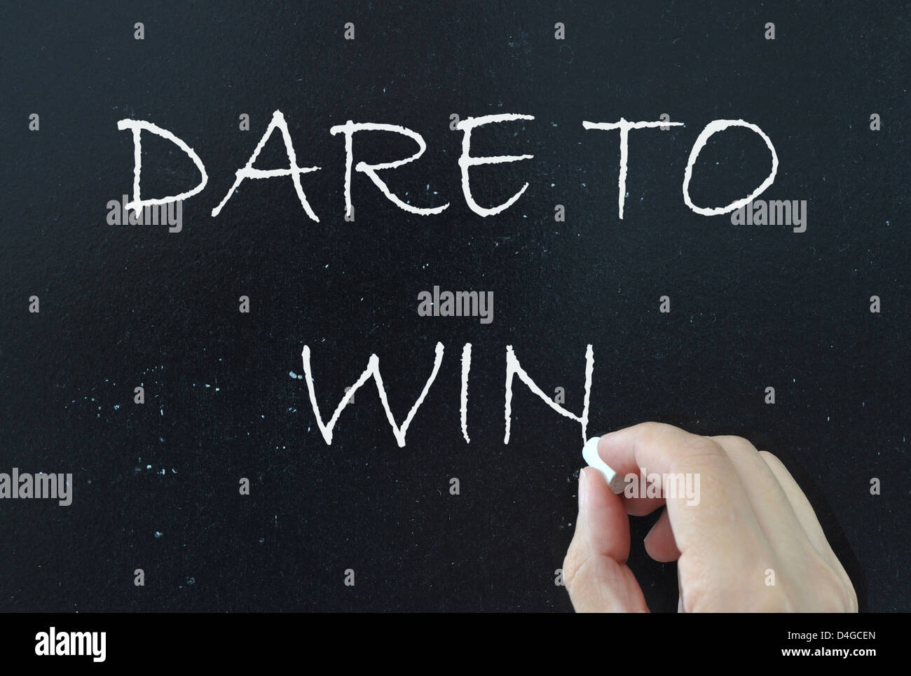 Dare to win Stock Photo - Alamy