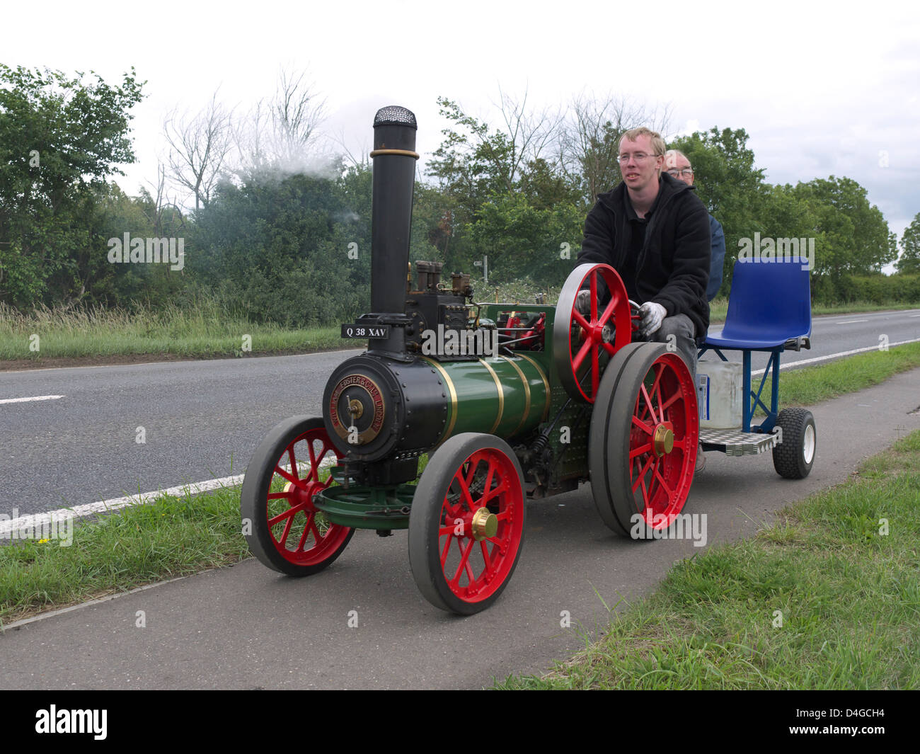 Miniature steam traction engine on a road run at Morton steam and ...