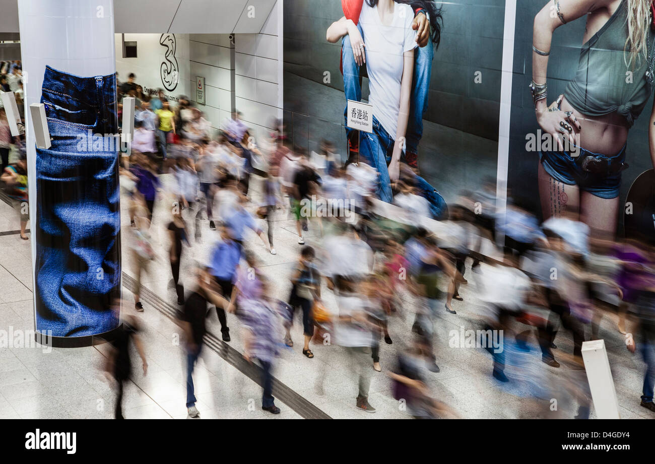 Commuters at rush hour in the Central Station of the Hong Kong Metro ...