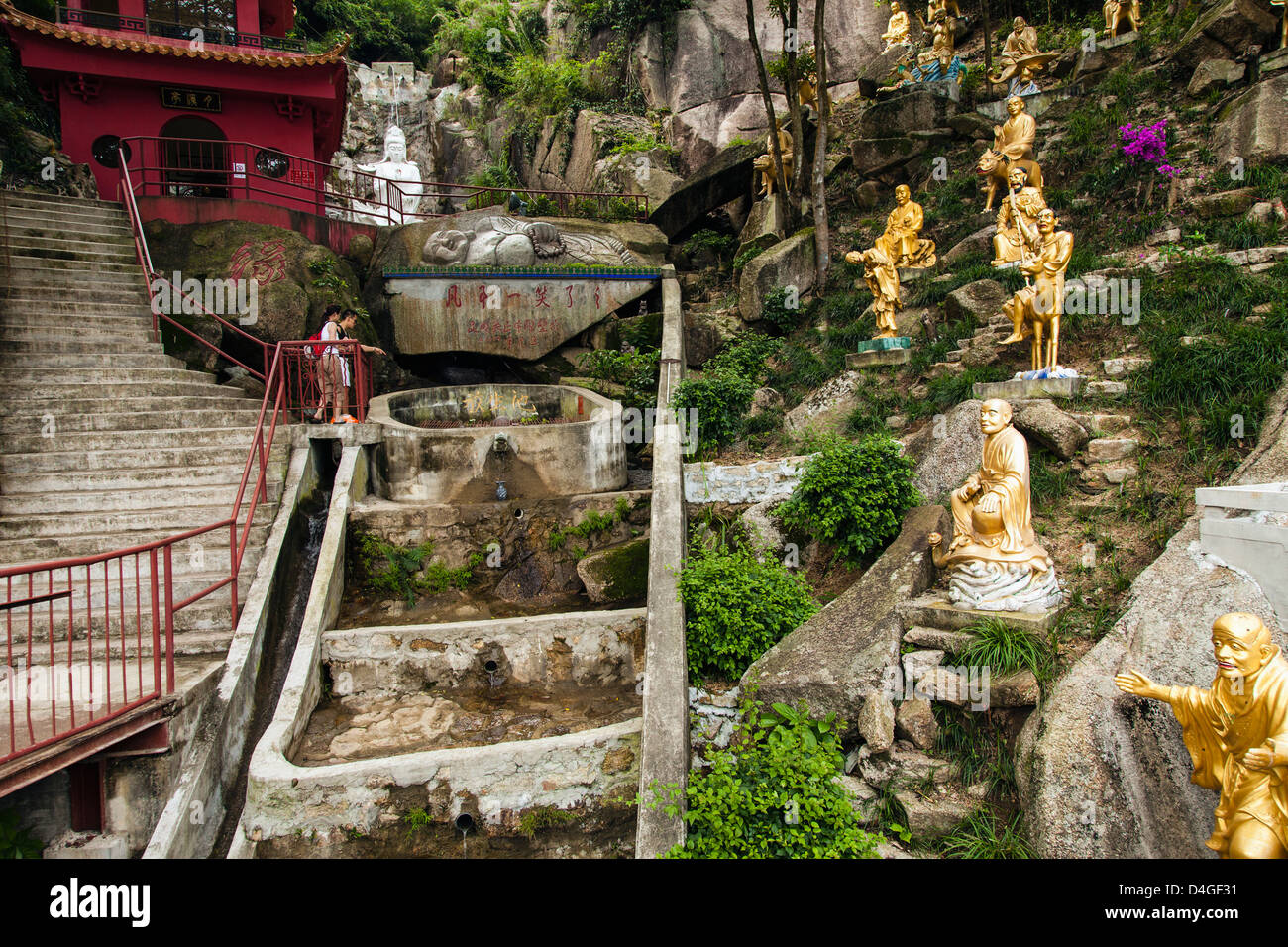 A young couple at the 10,000 Buddhas Monastery, New Territories, Hong ...