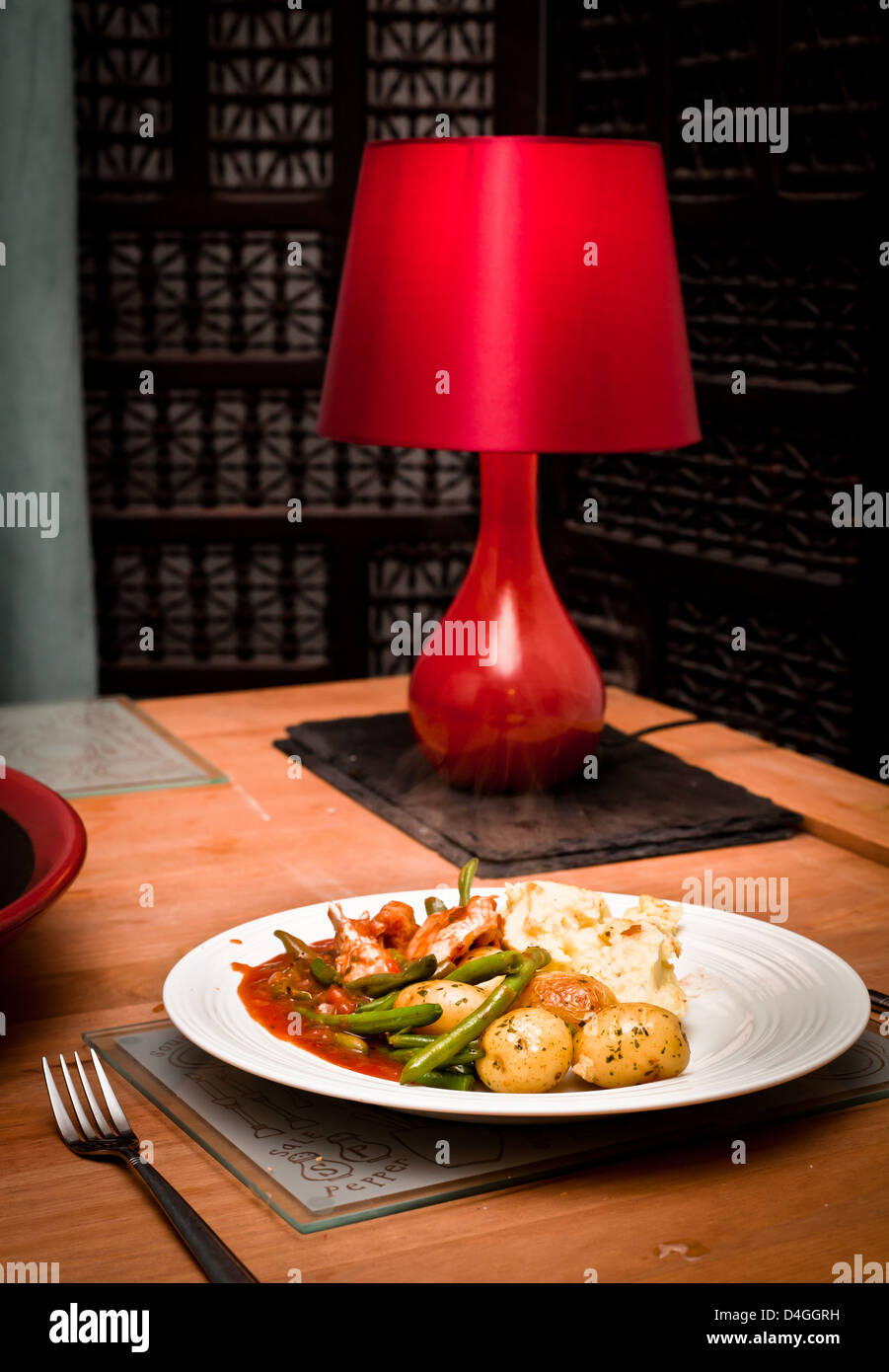 A freshly made hot meal on a table Stock Photo - Alamy