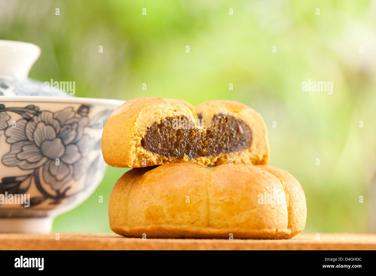 Chinese traditional dessert with a cup of tea Stock Photo - Alamy