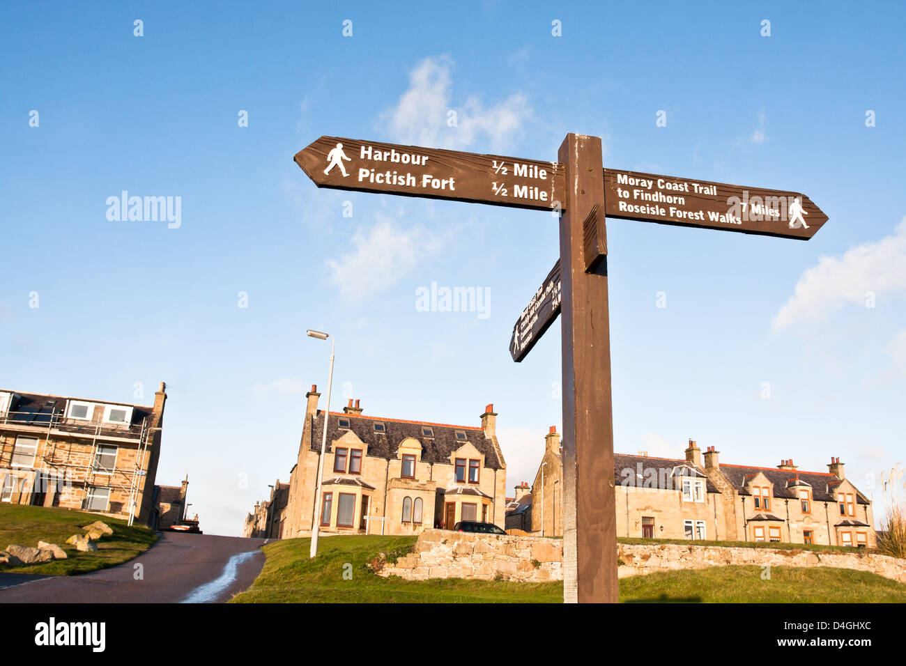 Wooden signpost for local attractions in Burghead, Scotland Stock Photo ...