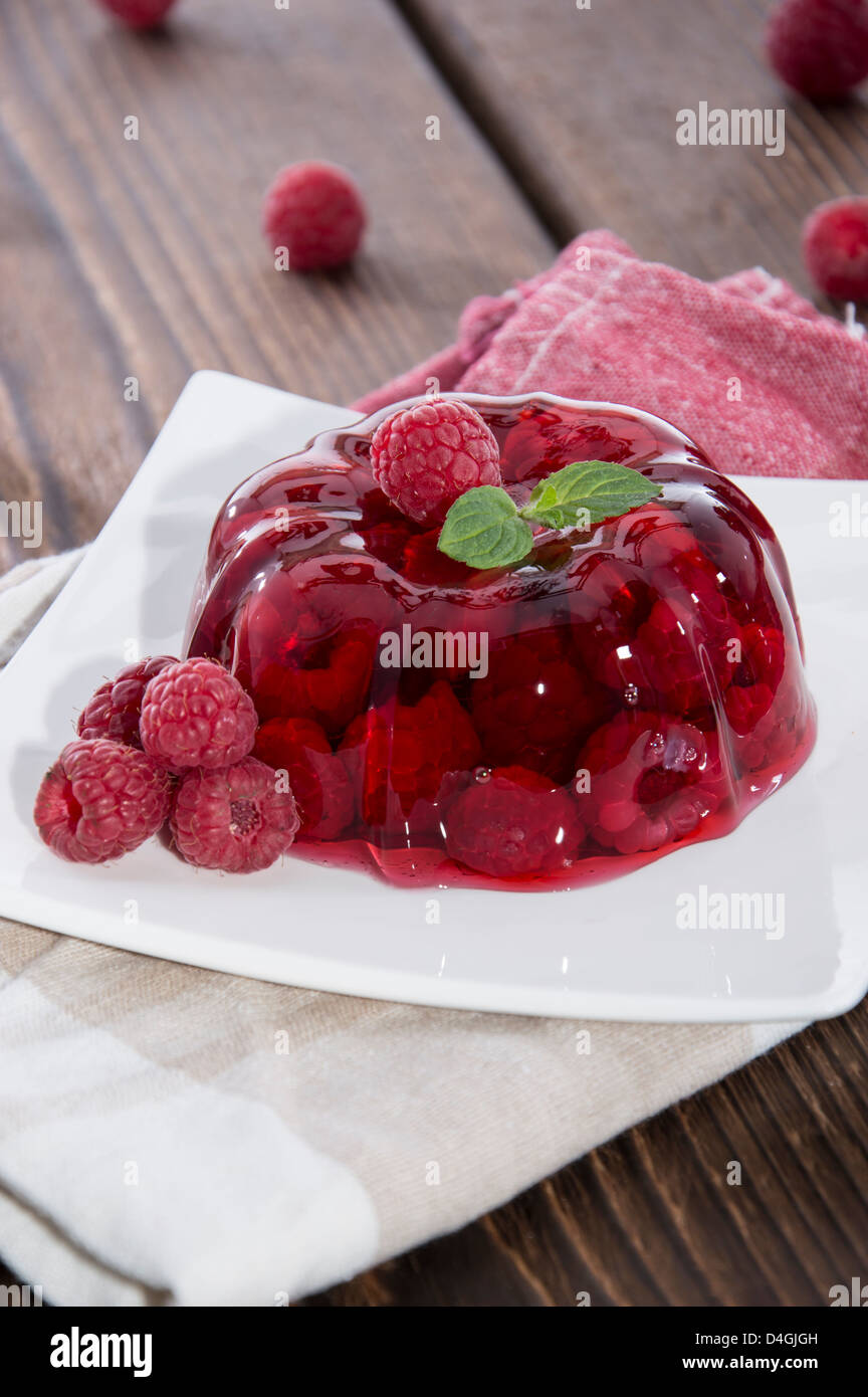 Raspberry Jello with fresh fruits Stock Photo - Alamy