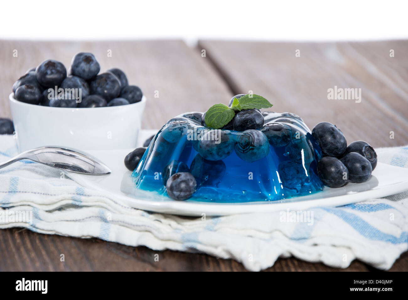 Blueberry Jello with fresh fruits isolated on white background Stock ...